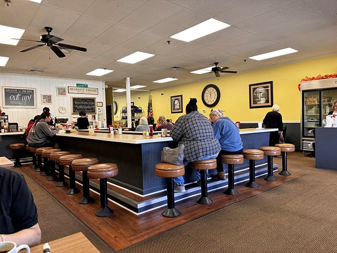 Counter seating: where solo diners become part of the restaurant family and the coffee refills flow like conversation.