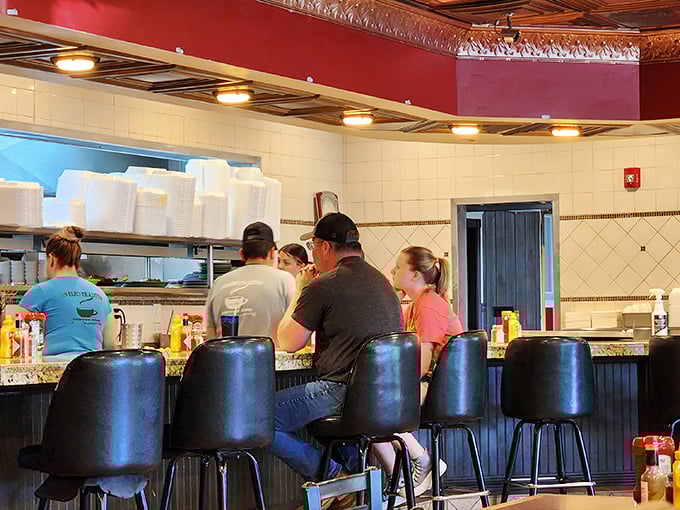Counter seating: where solo diners become part of the Coffee Mug family and get front-row seats to the culinary action.