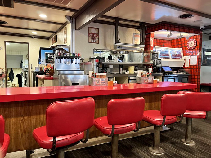 The counter seating offers front-row tickets to the culinary show, where breakfast dreams become delicious reality.
