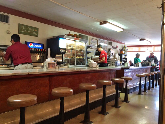 The counter where magic happens. That "Burger Basket 50&cent;" sign isn't false advertising&mdash;it's just a few decades behind inflation.