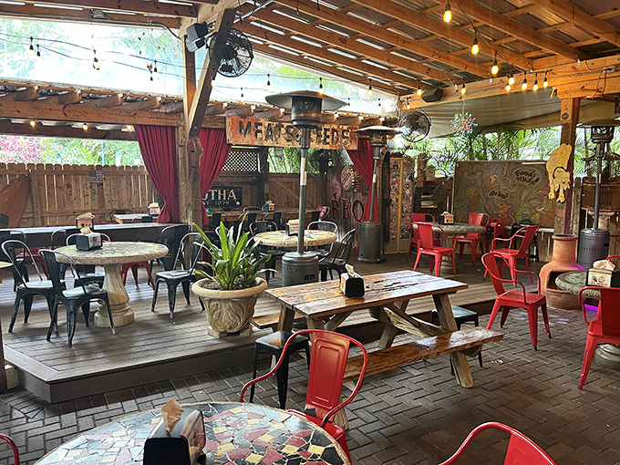 This covered patio isn't just outdoor seating&mdash;it's an open-air living room where strangers become friends over shared BBQ enthusiasm.