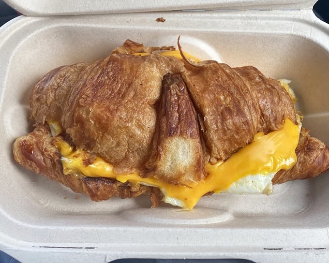 This croissant sandwich doesn't just say "good morning"&mdash;it sings it in perfect harmony. Melty cheese and golden pastry creating a breakfast love story for the ages.