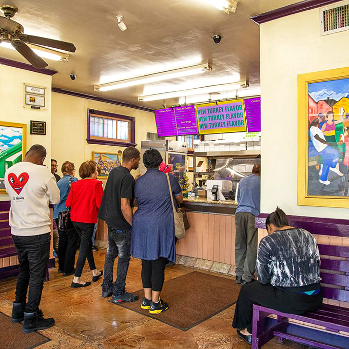 The lunch rush at McHardy's is democracy in action. Everyone from construction workers to office folks united by fried chicken devotion.