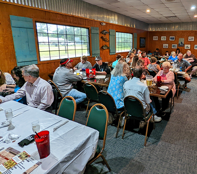 A dining room filled with the beautiful symphony of conversation, laughter, and the occasional appreciative silence that follows the first bite of something wonderful.
