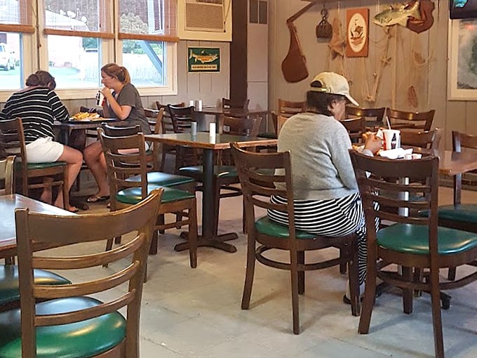 The dining room hums with the universal language of seafood appreciation&mdash;forks diving, heads nodding, conversations pausing mid-bite. 