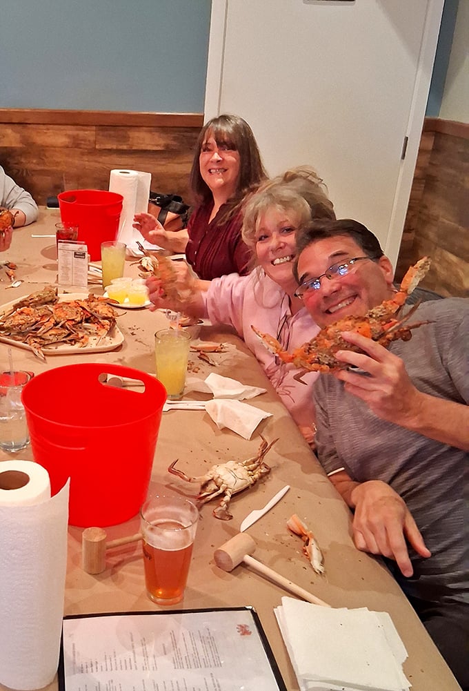The true measure of great seafood? Paper-covered tables, wooden mallets, and smiles that say, "This messy feast was worth every napkin."