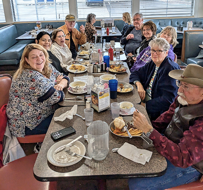 The true magic of diners captured in one shot&mdash;strangers becoming temporary family over plates of food that remind everyone of home.