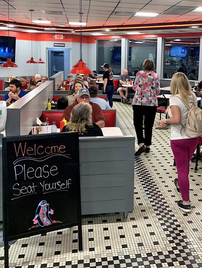 Lunchtime brings a diverse crowd—all united by their quest for the perfect hot dog in this Burlington institution.