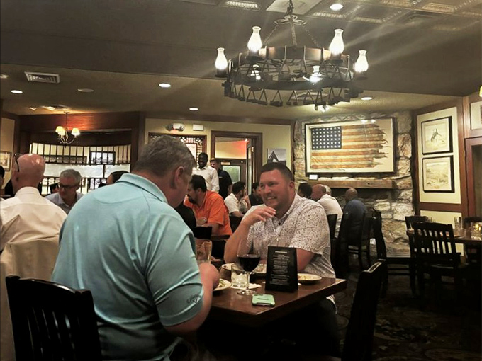 Where deals are made, celebrations unfold, and nobody's counting calories. The warm ambiance makes every table feel like the best seat in the house.