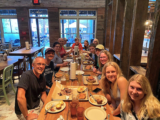 Happy faces around a communal table loaded with meat &ndash; this is what barbecue fellowship looks like in its natural habitat.