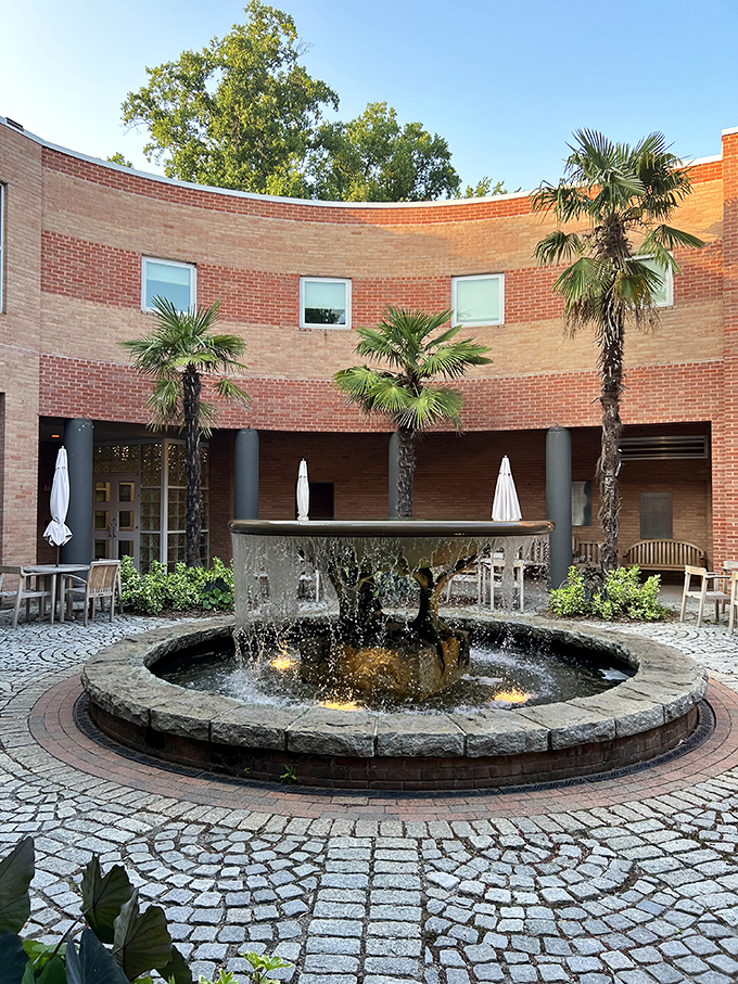 A peaceful courtyard fountain creates the perfect Mediterranean moment, minus the jet lag and currency exchange.