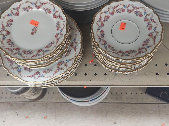 Delicate china patterns that once graced formal dinner tables now await their second act. Someone's grandmother is nodding in approval somewhere.