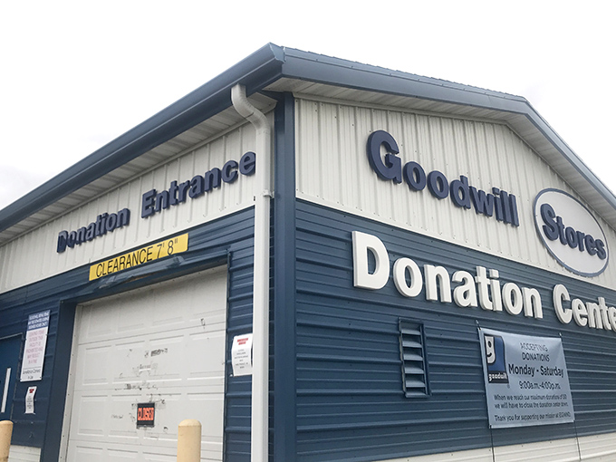 The donation center entrance where community generosity transforms into another shopper's treasure hunt, completing the beautiful secondhand circle of life.
