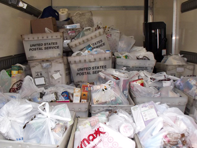 Mountains of donations waiting to be sorted, proving this community knows how to give back in style.