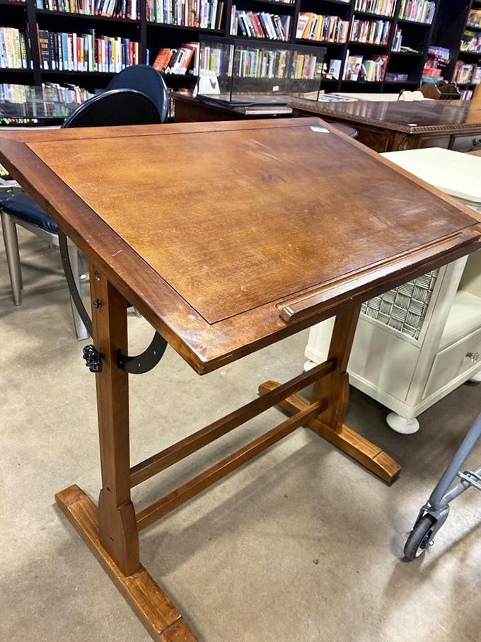 A drafting table that whispers of architectural dreams and artistic ambitions. Behind it, shelves of books offer inspiration for whatever you might create.