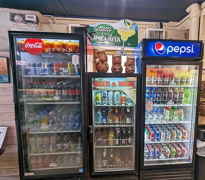 Decisions, decisions! The drink coolers offer cold salvation for thirsty beachgoers, from craft beers to classic sodas.