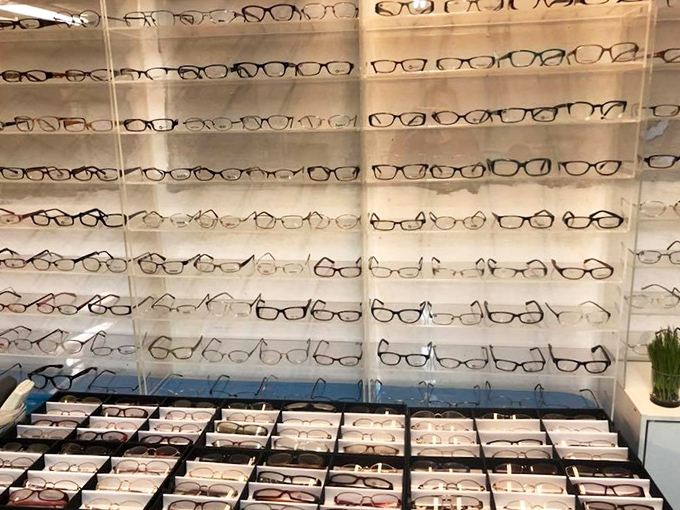 Wall of vision possibilities&mdash;find your perfect frames without the optometrist markup. See clearly, spend wisely!