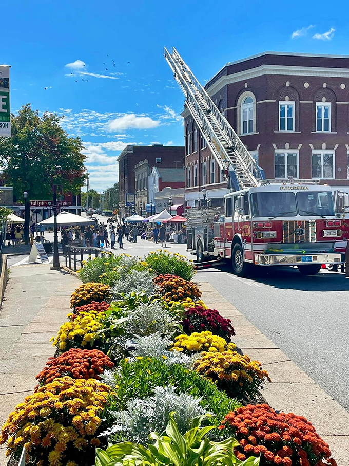Community events bring Gardner's downtown to life, where fire trucks, flower displays, and friendly faces create the quintessential small-town experience.