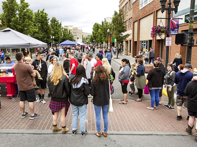 Street festivals transform downtown into a vibrant community living room where neighbors become friends and strangers don't stay strangers for long.