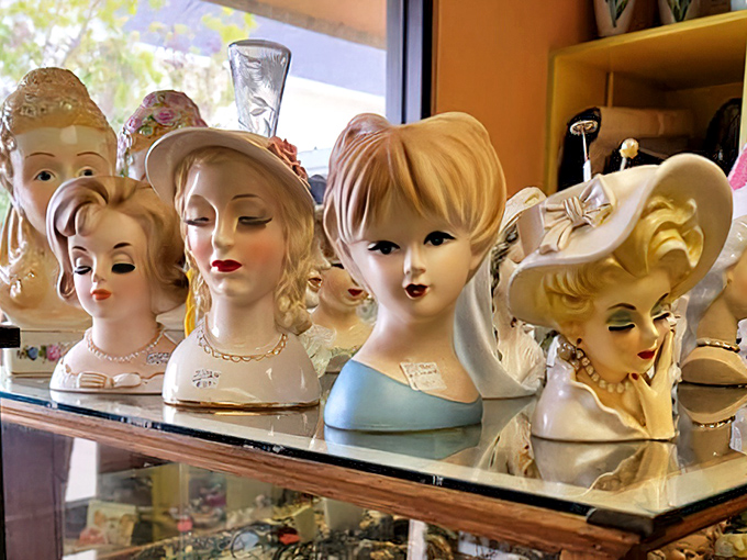 The lady head vase brigade stands at attention. These mid-century beauties once held flowers on dressing tables across America.
