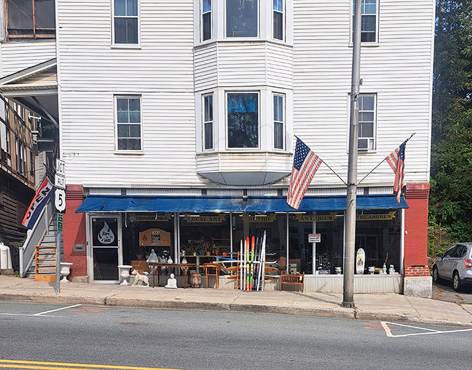 Fire On The Hill's storefront displays Vermont's outdoor spirit, with flags waving a patriotic welcome to adventurers and collectors alike.