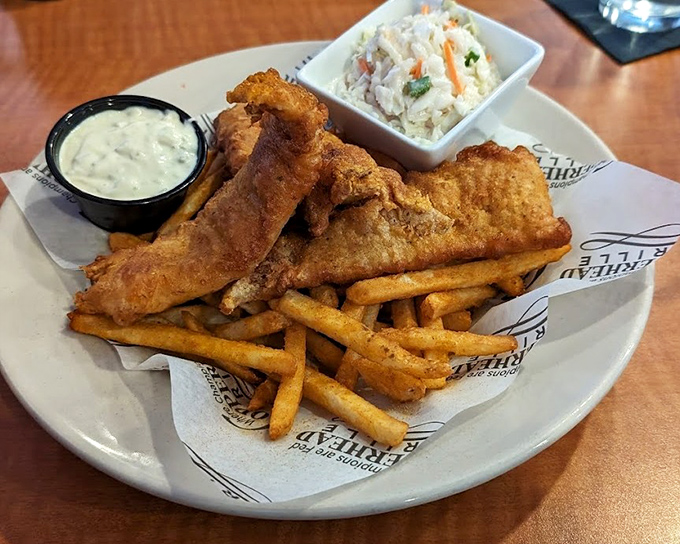 Fish and chips that would make a British pub proud, with a tartar sauce sidekick that deserves equal billing in this crispy-flaky production.
