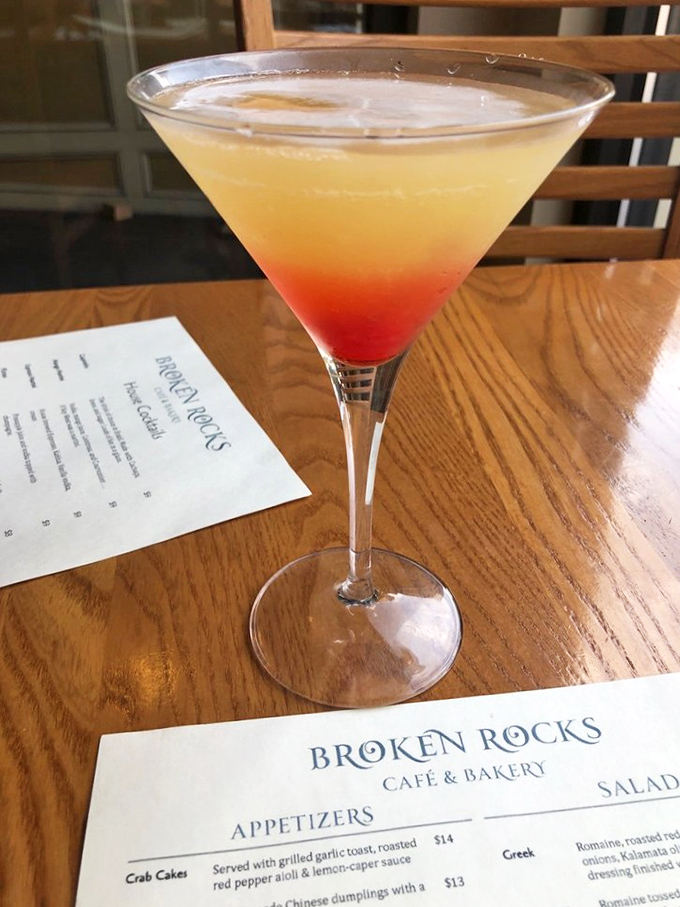 Sunrise in a glass—this gradient cocktail promises the kind of evening where stories are made and calories don't count.