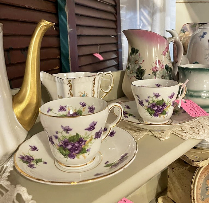 Tea sets that would make the Dowager Countess approve. Those violet patterns have probably hosted more gossip than a Facebook group.