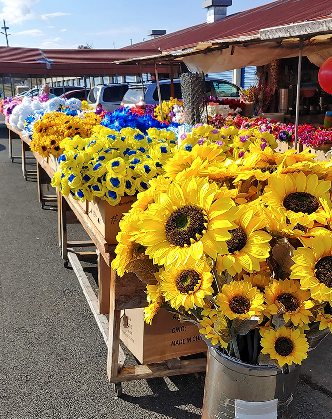 A sunshine explosion of artificial flowers brightens even the cloudiest day. These sunflowers never wilt and neither will your decorating spirit.