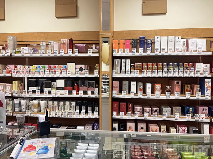 Fragrance bottles lined up like soldiers, ready to help you smell considerably better than your current situation allows.