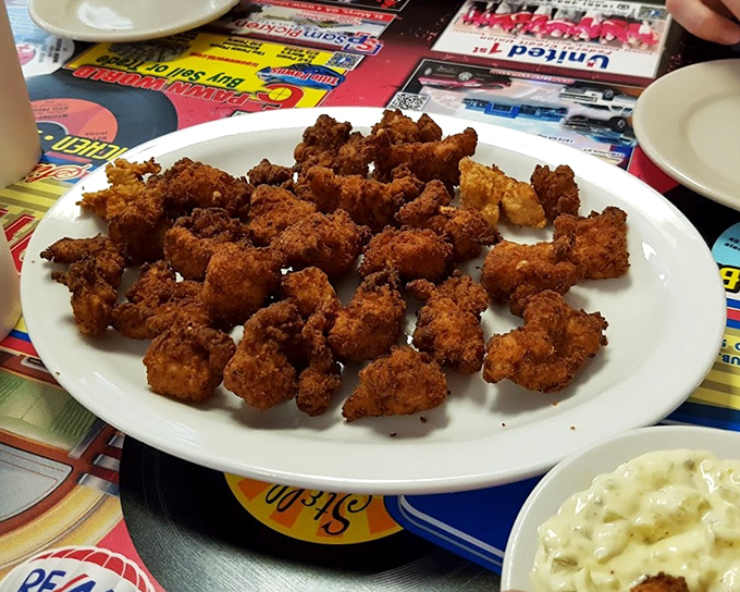 Fried bites of heaven arranged on a plate like edible gold nuggets. The kind of appetizer that makes sharing a moral dilemma.