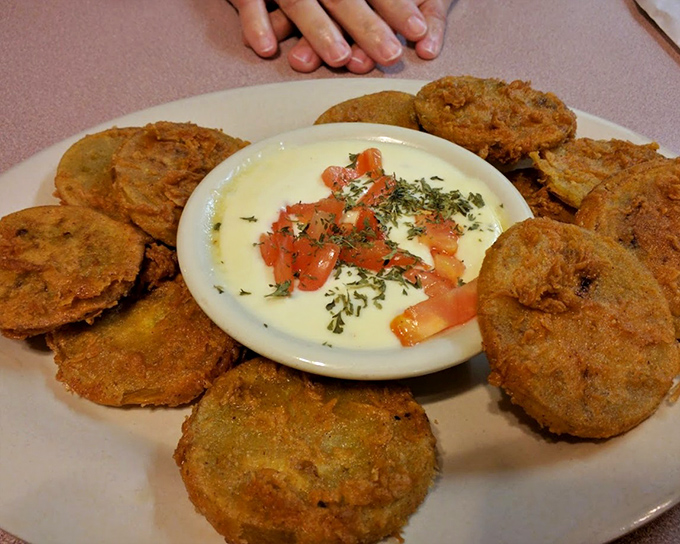 Fried green tomatoes arranged around a creamy center like edible works of art that taste even better than they look.