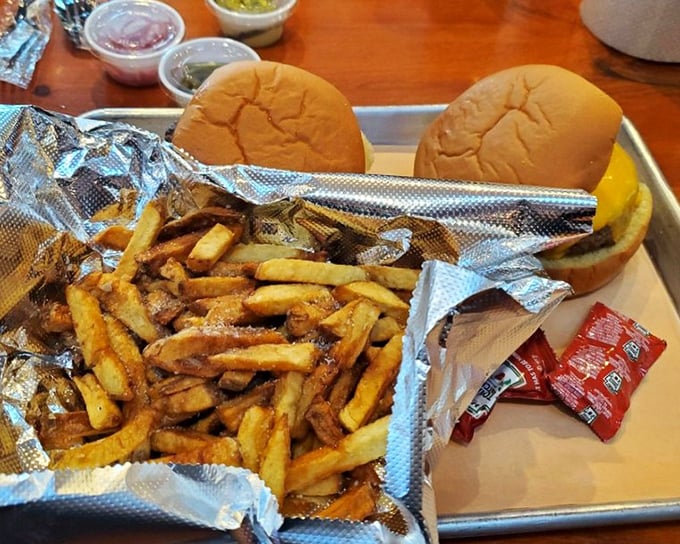 Hand-cut fries and fresh buns waiting to embrace their brisket filling&mdash;a sandwich that requires both hands and possibly a nap afterward.