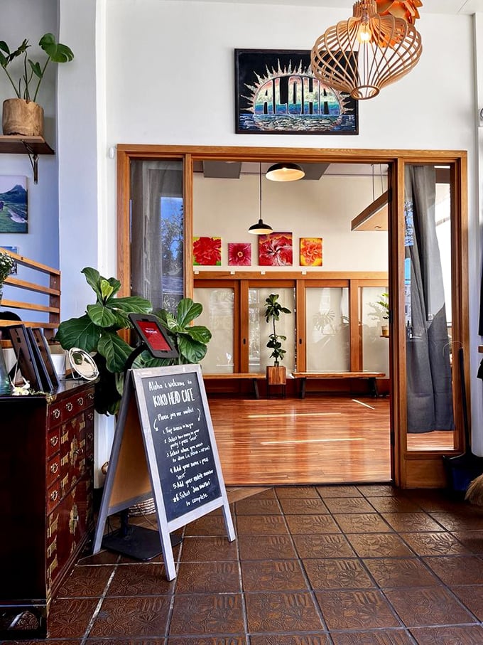 The entrance welcomes you with island charm and a chalkboard promising delicious adventures. First impressions matter, and this one's a keeper.