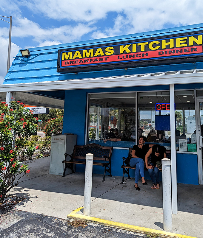 Sunshine streams through the windows, illuminating blue booths that have cradled countless Tampa residents through their morning rituals.