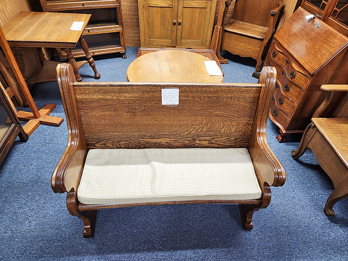 This oak church pew isn't just furniture; it's a piece of history that would make a statement in any entryway or garden. 