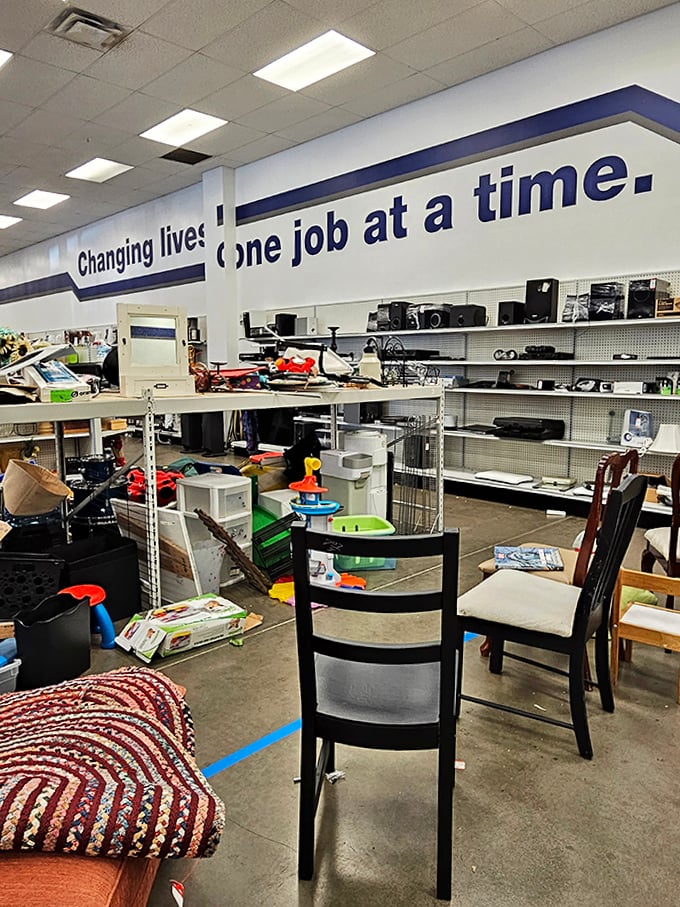 The store's mission statement adorns the walls, reminding shoppers that each purchase powers job training and community support.
