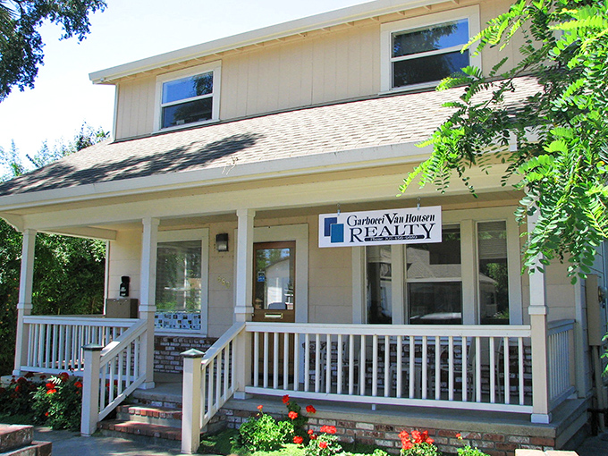 Garbocci Van Housen Realty operates from a charming house with a proper porch &ndash; because selling homes should feel homey, not corporate.