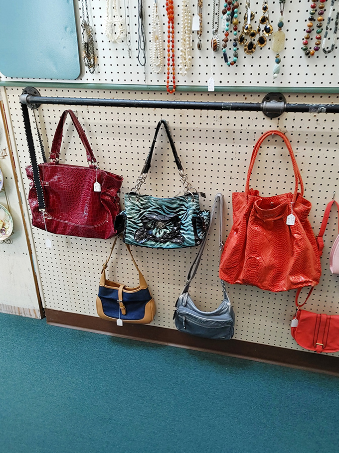 Handbag heaven for the fashionista on a budget. That red croc-embossed tote is practically begging for a second chance at life.