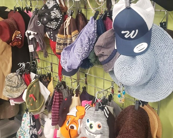 Hat heaven hanging on the wall! From baseball caps to sun hats, this collection offers head-topping possibilities for every Rhode Island weather scenario.