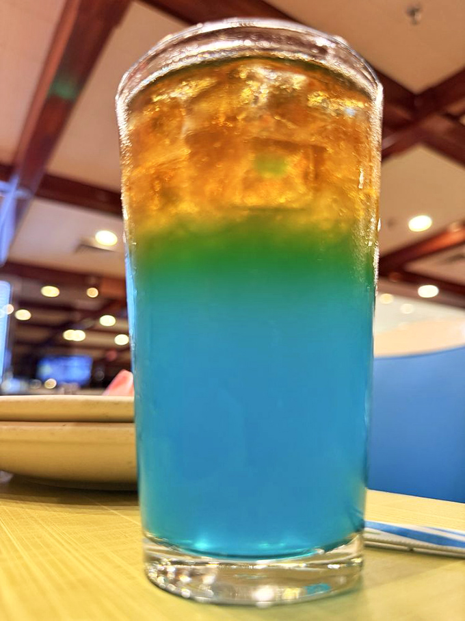 A cocktail so vibrant it looks like it's auditioning for a role in a tropical vacation brochure.