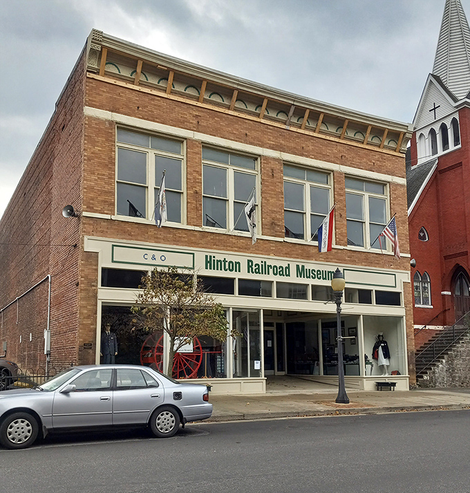 The Hinton Railroad Museum celebrates the iron horses that birthed this town, standing as proudly as a train conductor checking his pocket watch.