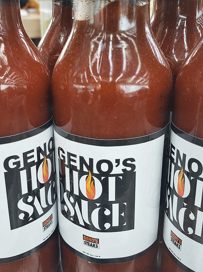 Bottles of liquid courage lined up like soldiers. Geno's Hot Sauce adds that perfect kick that separates the casual diners from the true believers.