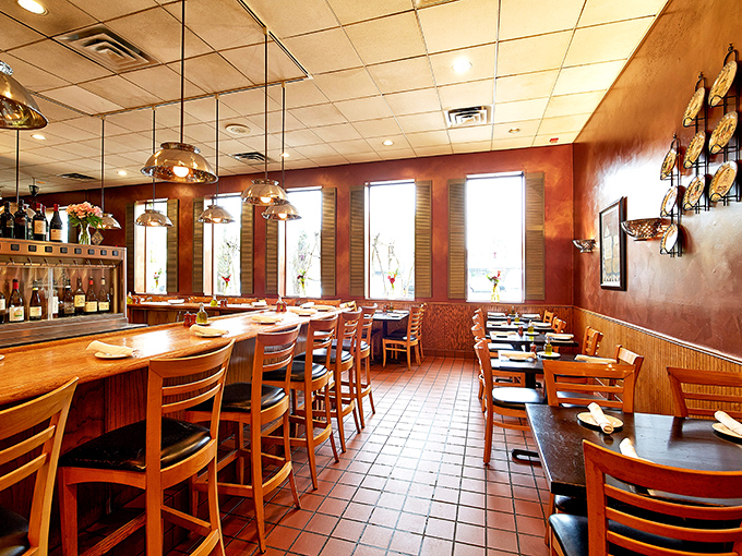 A dining room designed for lingering over that last bite of pasta and second glass of wine. The warm lighting flatters both the food and your face.