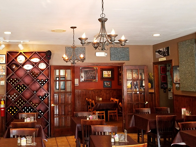 Hollywood's warm interior invites you to linger over dinner, where the wine rack promises perfect pairings for those heavenly crab cakes.