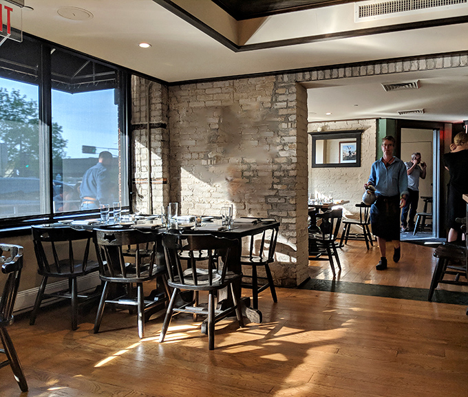 Whitewashed brick walls and golden hour light transform ordinary meals into memories you'll revisit during boring meetings.