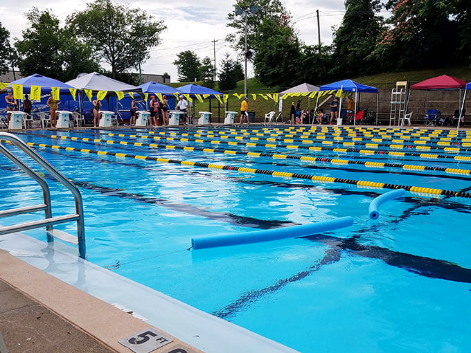 Summer in Jasper means competitive swimming meets where community spirit makes a bigger splash than the athletes diving into the pristine pool.