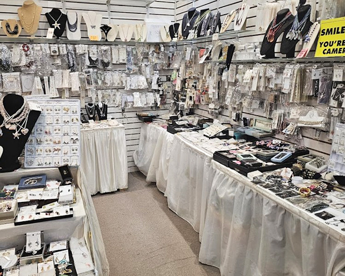 Jewelry displays transform ordinary shopping into treasure hunting, with sparkly possibilities arranged like an elegant buffet for your accessory appetite.