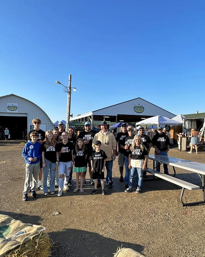 "Got Junk?" shirts unite these treasure hunters at what appears to be Carrington's celebration of repurposing, recycling, and remarkable finds.