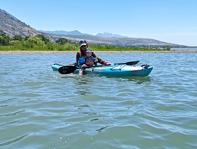 Kayaking: where conversations flow as smoothly as paddles through water, and family memories are made one stroke at a time.